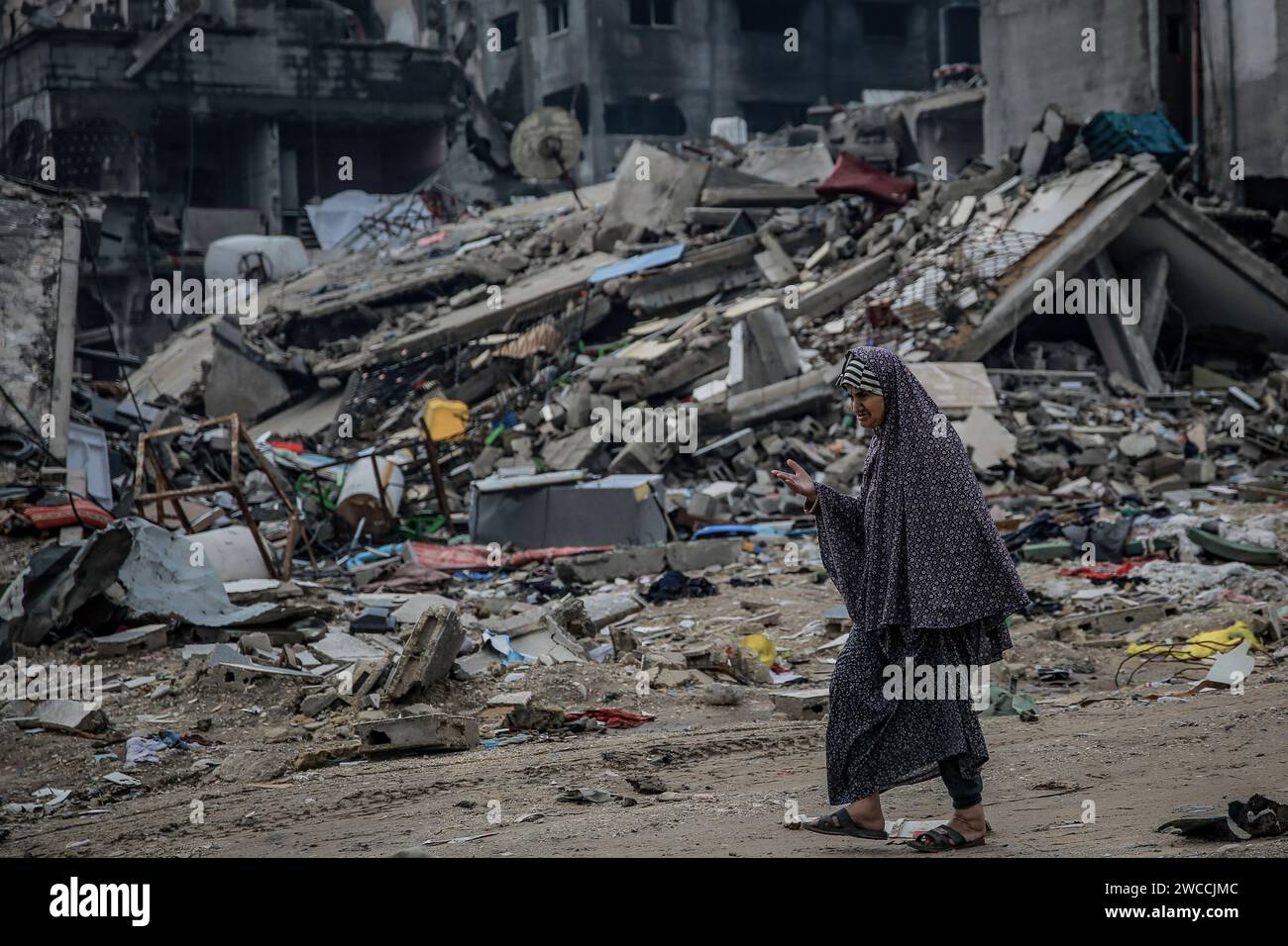 Gaza City, Palestinian Territories. 15th Jan, 2024. A Palestinian woman ...