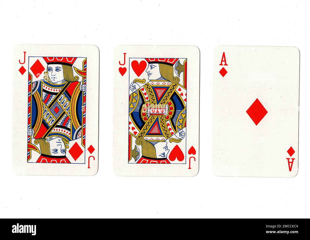 Vintage playing cards showing a pair of red jacks and a red ace ...