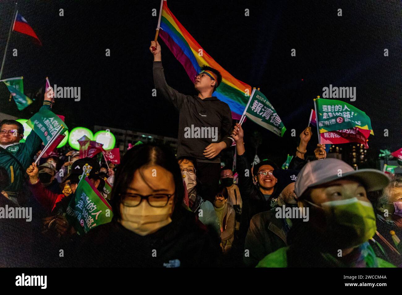 New Taipei City, Taiwan. 12th Jan, 2024. A supporter seen waving an ...