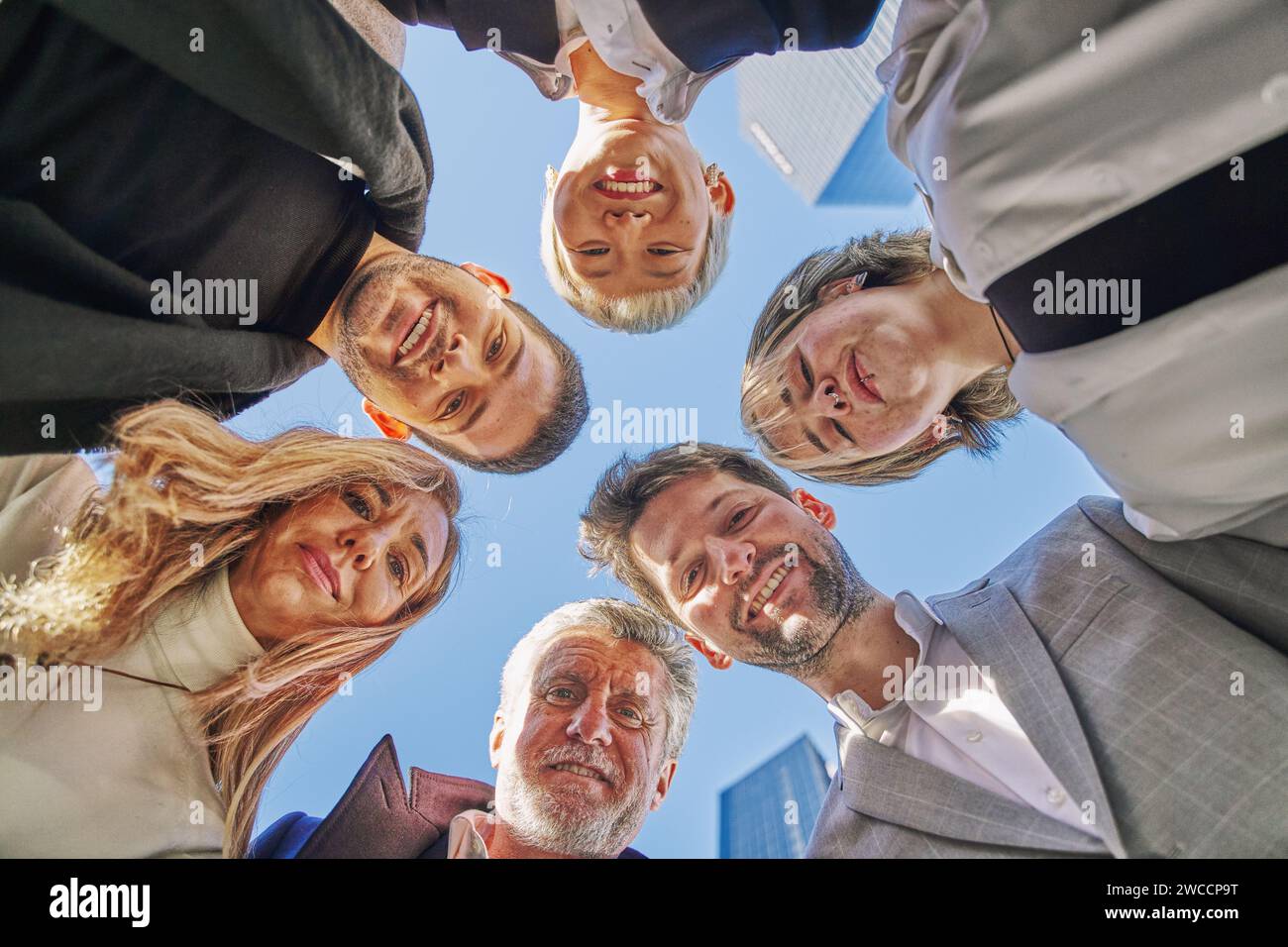 Portrait close up bottom view happy faces of diverse employees team ...
