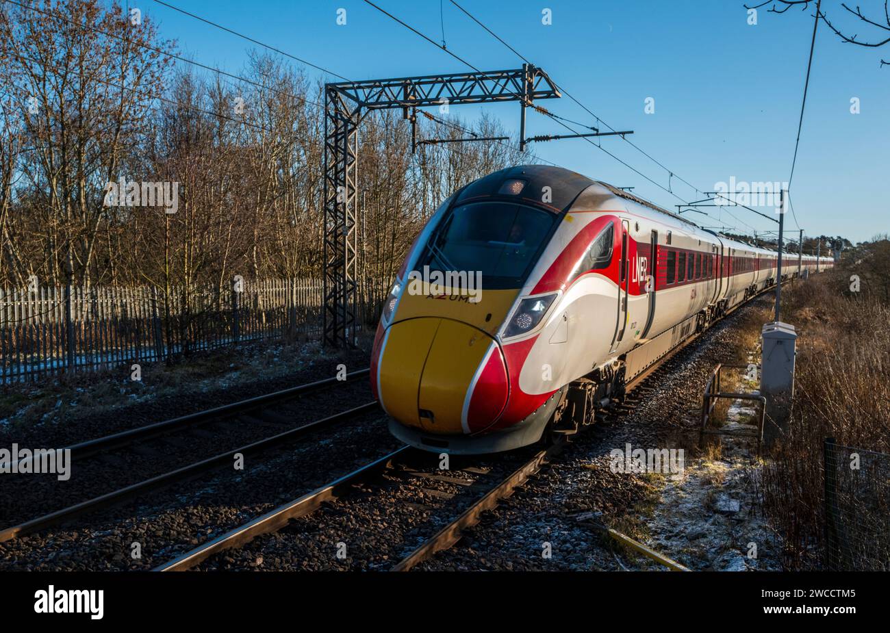LNER Inter-City express passing through Carluke station, South ...