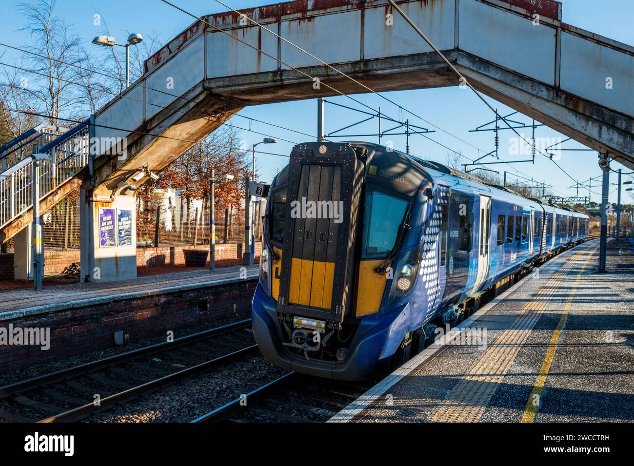 ScotRail Express commuter train at Carluke station in South Lanarkshire ...