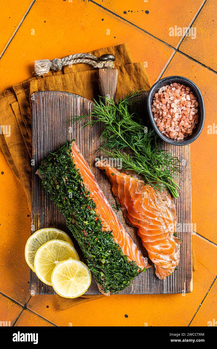 Scandinavian Gravlax Salmon fillet with dill, salt and papper. Orange ...