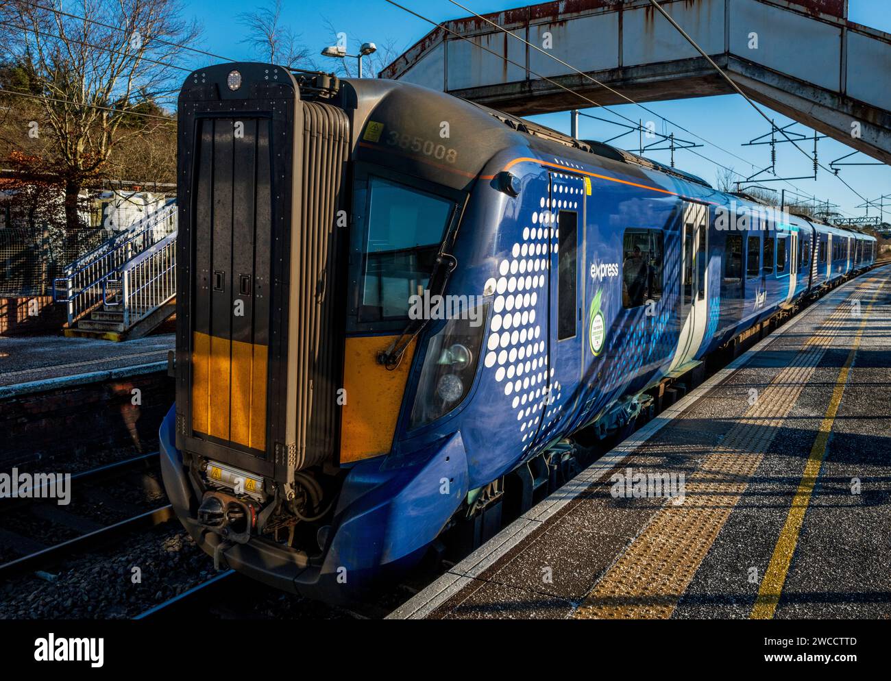 ScotRail Express commuter train at Carluke station in South Lanarkshire ...