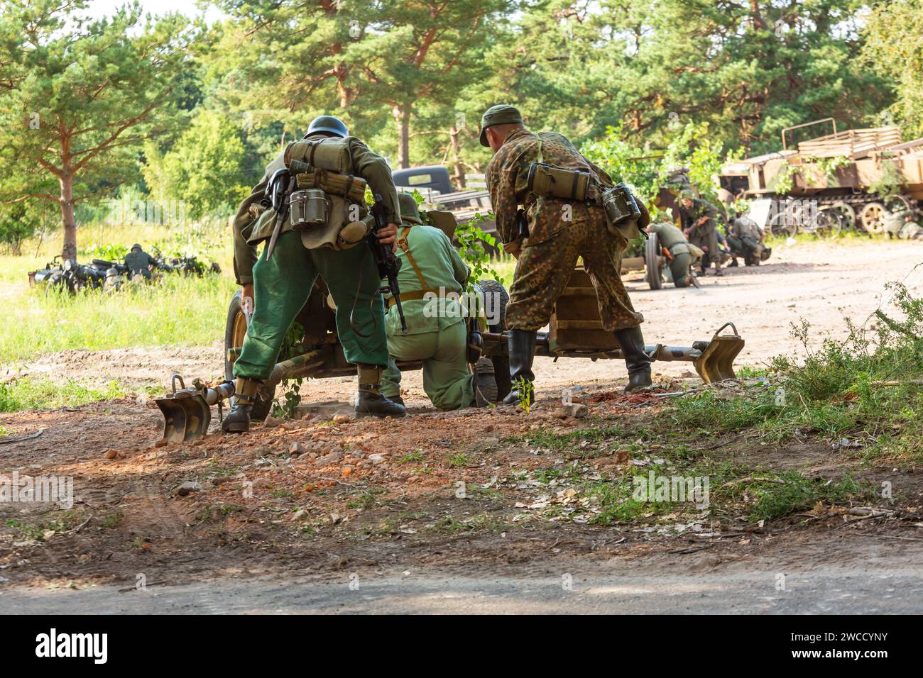Reconstruction of battle from the Second World War. The crew of a ...