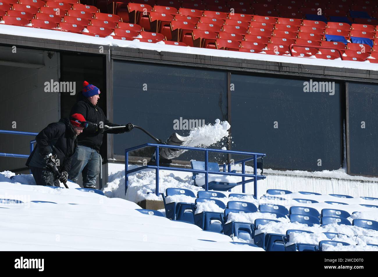 Orchard Park, New York, USA. 15th Jan, 2024. January 15th, 2024 fans shoveling snow at Highmark ...