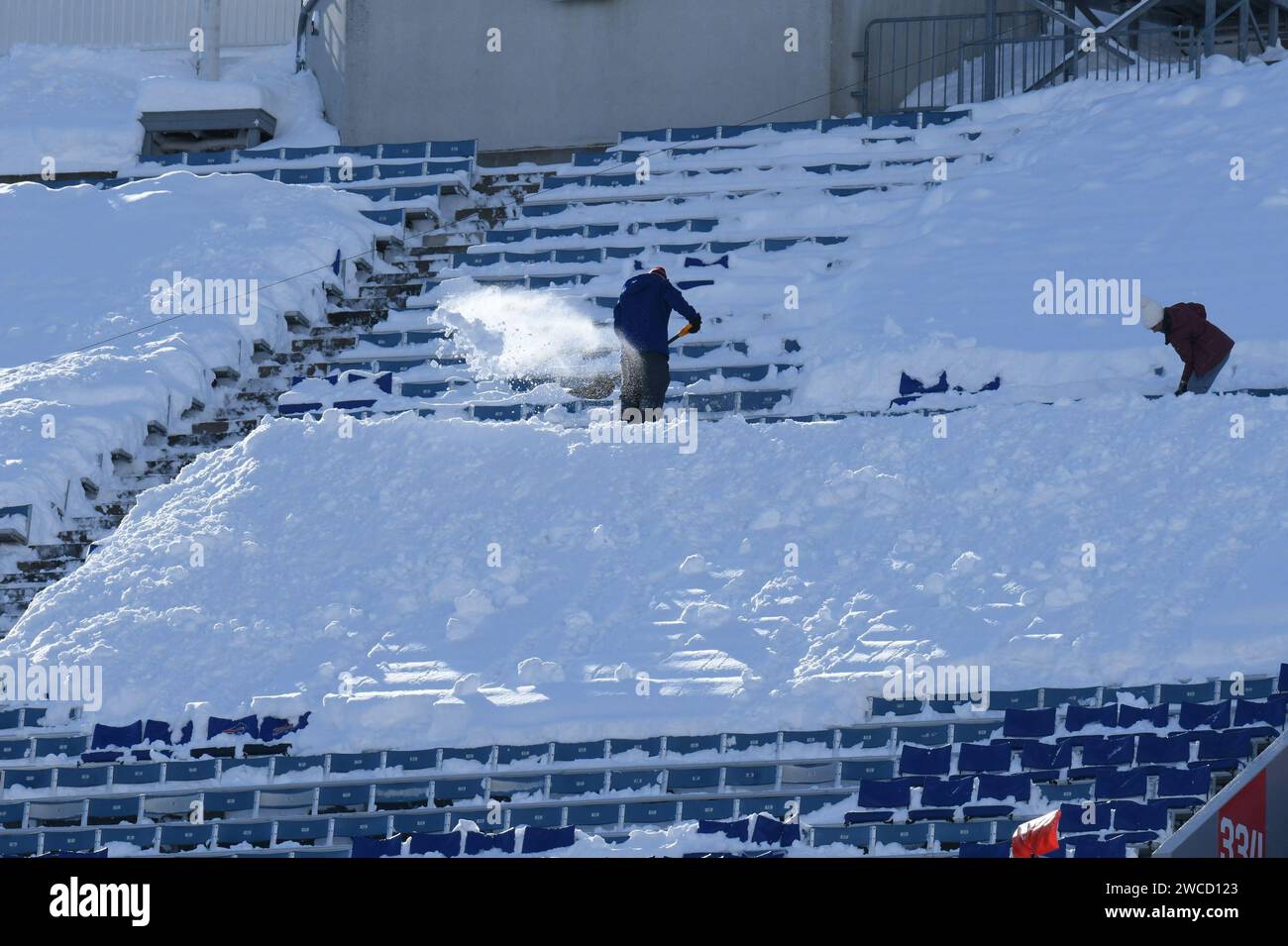 Orchard Park, New York, USA. 15th Jan, 2024. January 15th, 2024 fans shoveling snow at Highmark ...