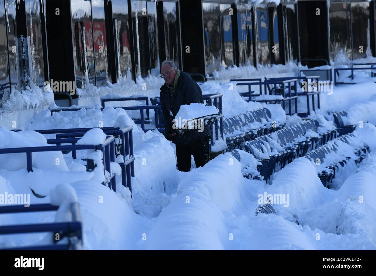 Orchard Park, New York, USA. 15th Jan, 2024. January 15th, 2024 fans shoveling snow at Highmark ...