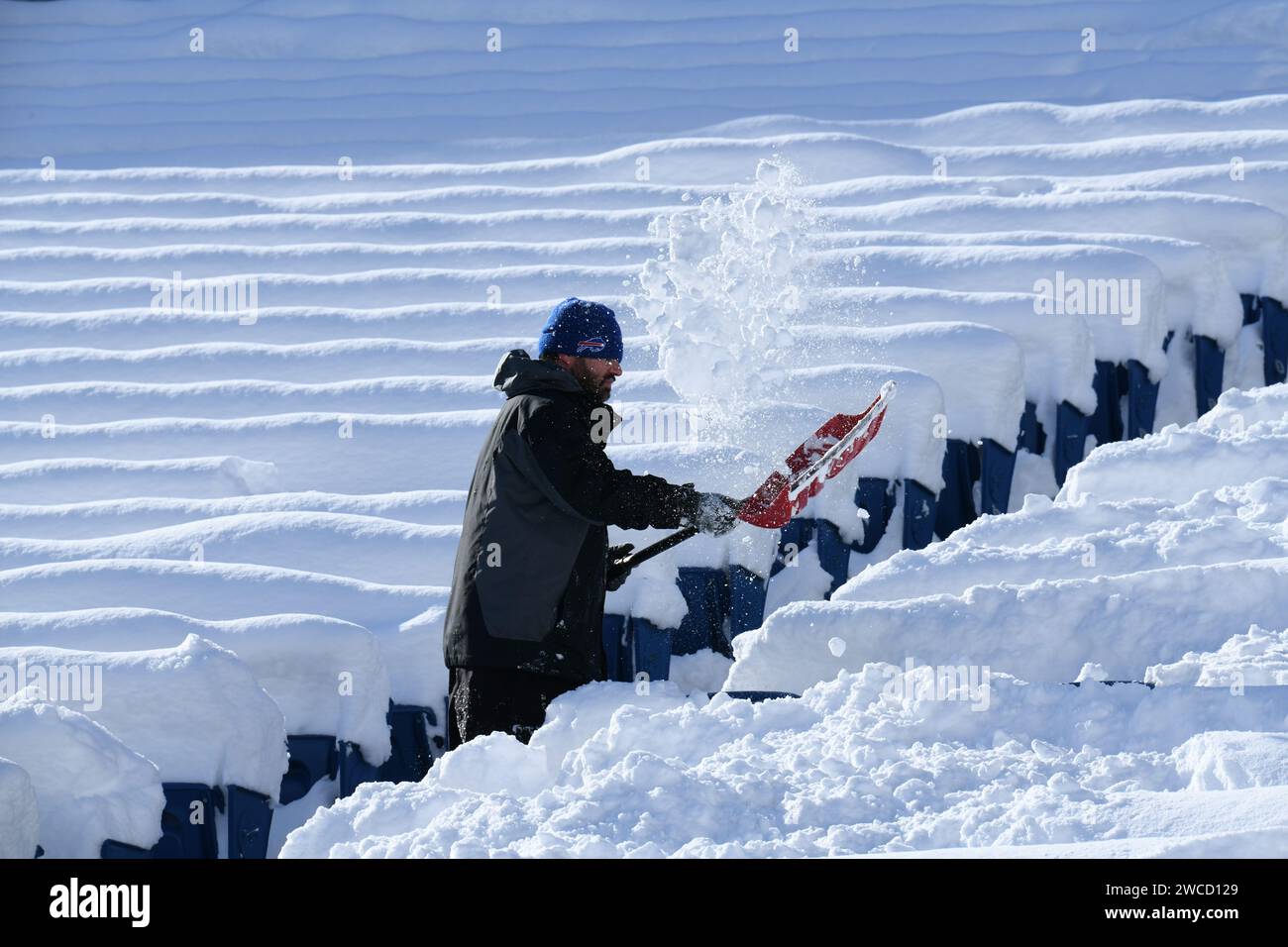 Orchard Park, New York, USA. 15th Jan, 2024. January 15th, 2024 fans shoveling snow at Highmark ...