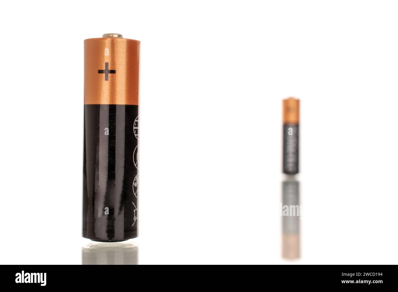 Two batteries, macro, isolated on white background Stock Photo - Alamy