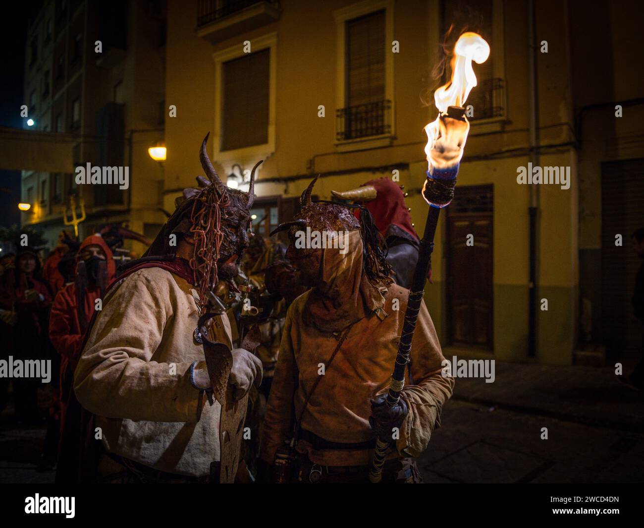 Correfocs (fire runners) through the streets of Sagunto in the ...