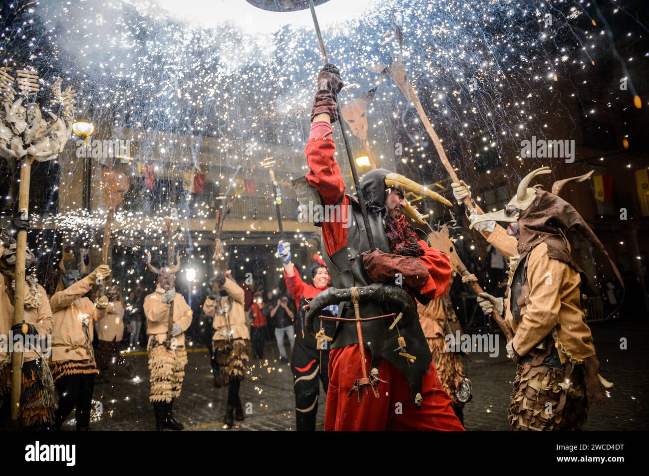 Correfocs (fire runners) through the streets of Sagunto in the ...
