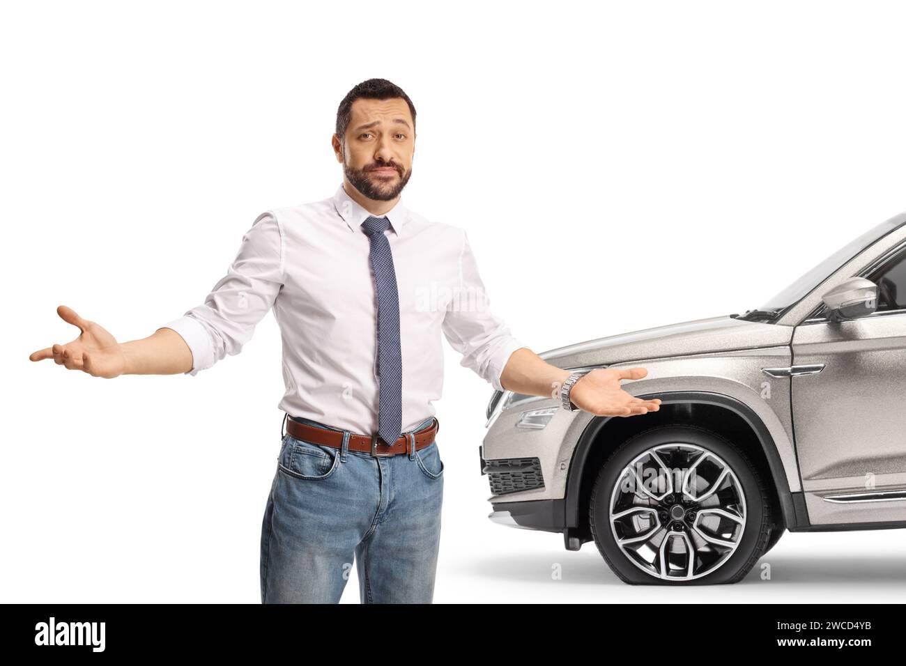 Man standing in front of a car with a flat tire isolated on white ...