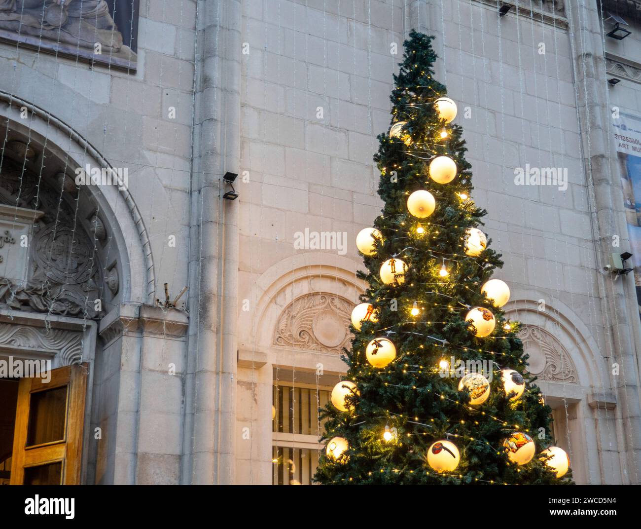 An artificial Christmas tree with large balls near a government office ...