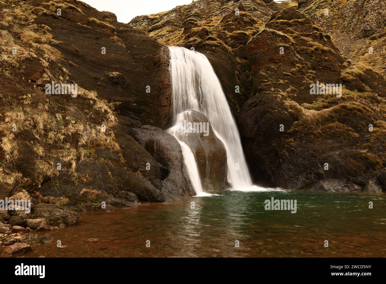 Helgufoss is a waterfall near the capital of Iceland, located in ...