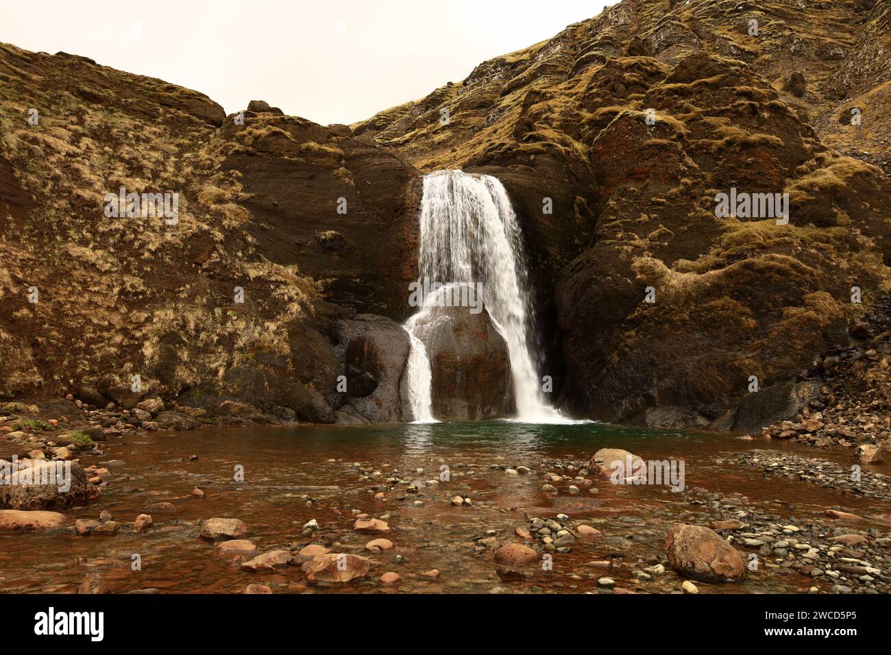 Helgufoss is a waterfall near the capital of Iceland, located in ...