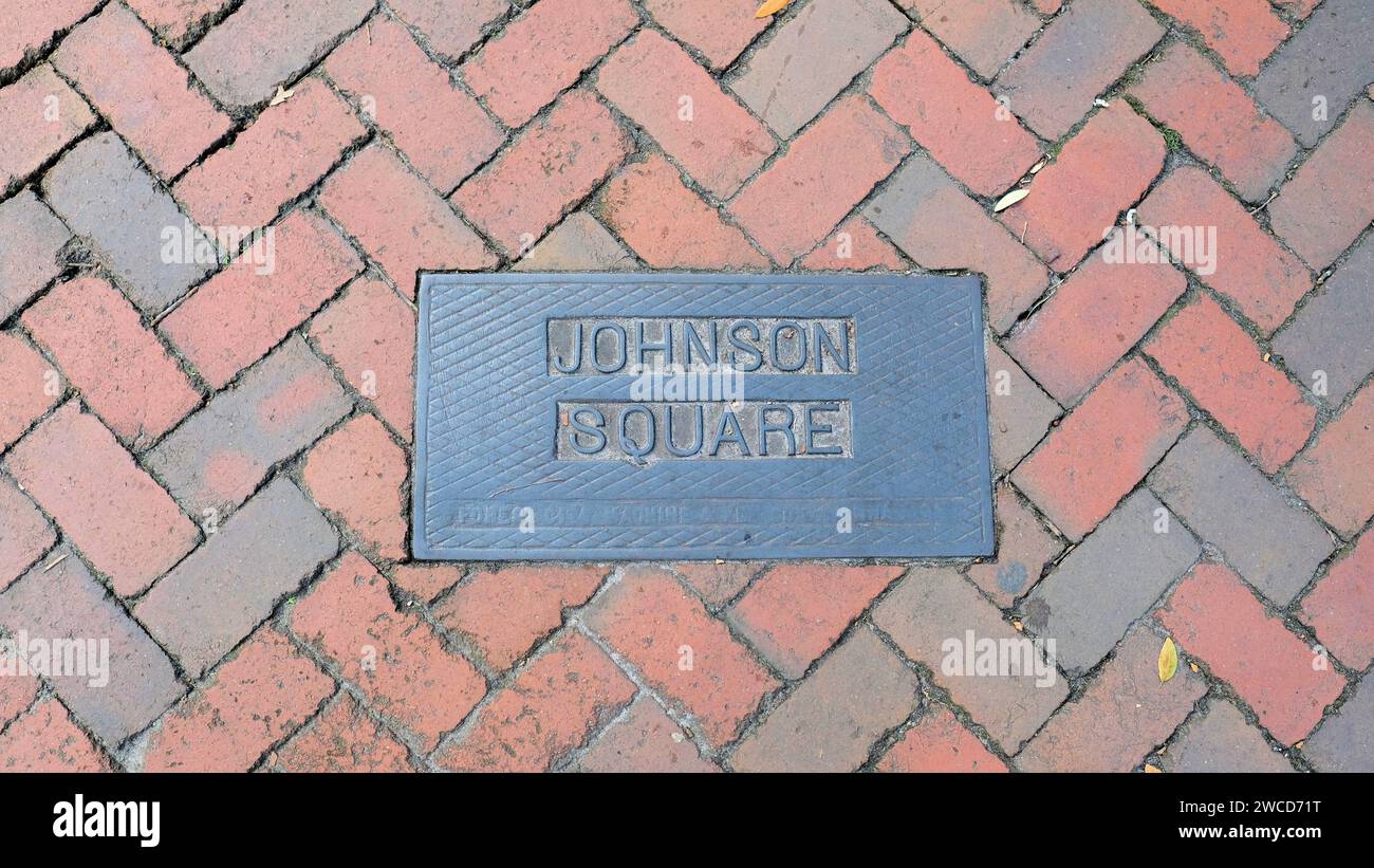 Johnson Square name plaque on a brick walkway in the oldest and largest ...