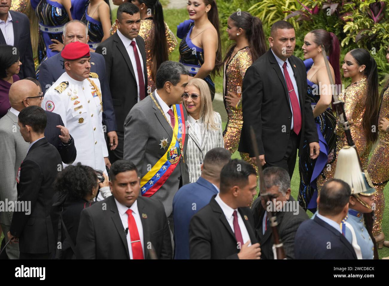 Venezuelan President Nicolas Maduro, center left, and first lady Cilia ...