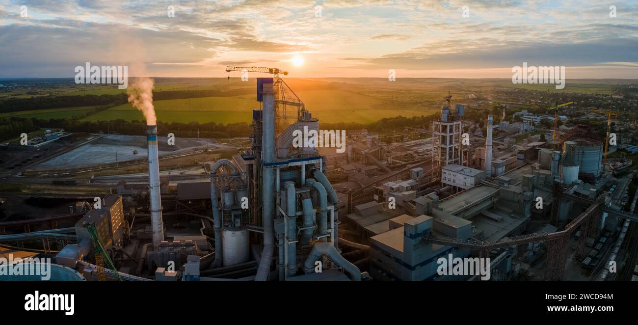 Aerial view of cement factory with high concrete plant structure and ...