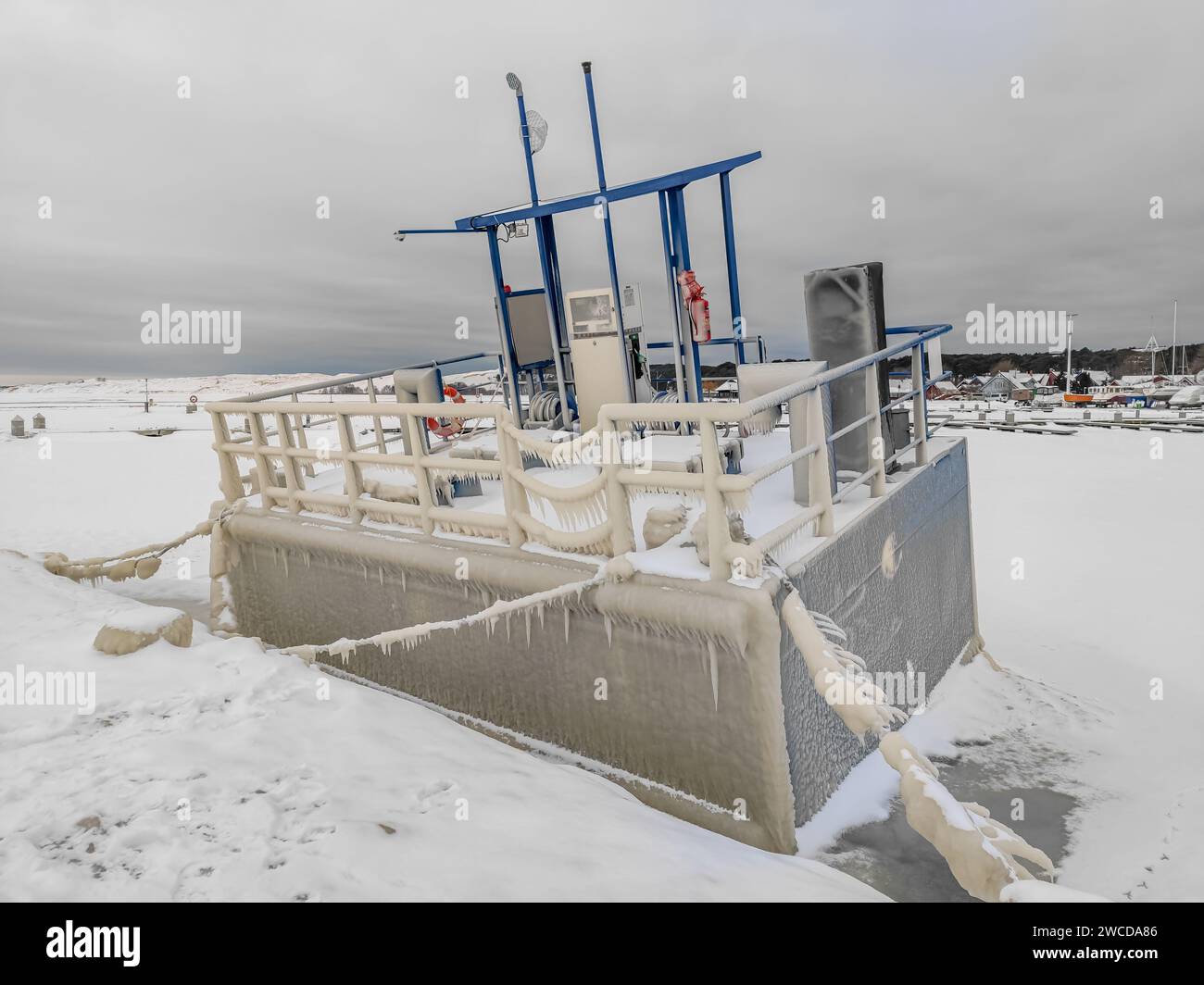 Spectacular ice formations on a boat petrol station cold and windy day ...