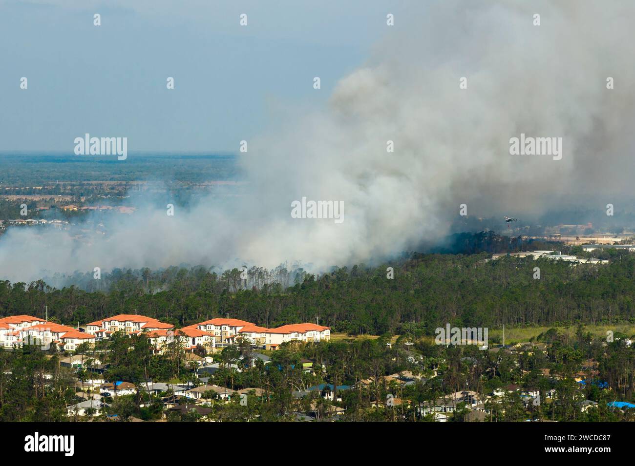 Aerial view of strong wildfire burning severely in North Port city ...