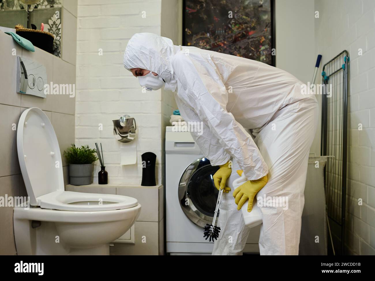 Bending over toilet hi-res stock photography and images - Alamy