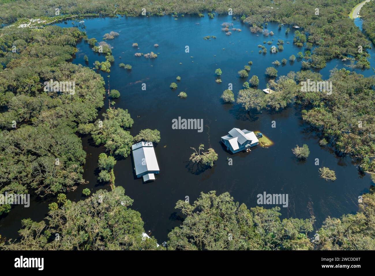 Aftermath of natural disaster. Surrounded by hurricane Ian rainfall ...