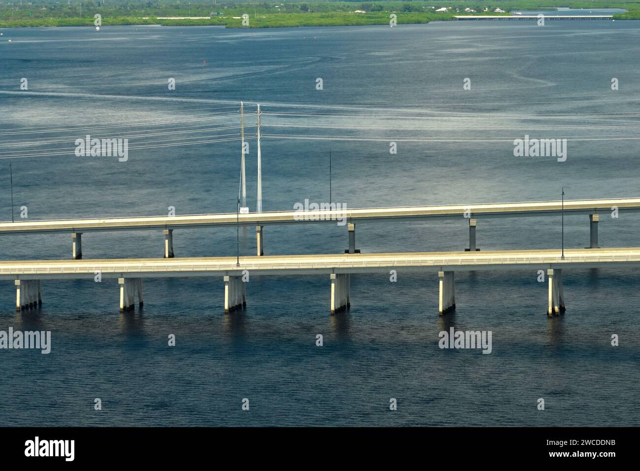 Barron Collier Bridge and Gilchrist Bridge in Florida with moving ...
