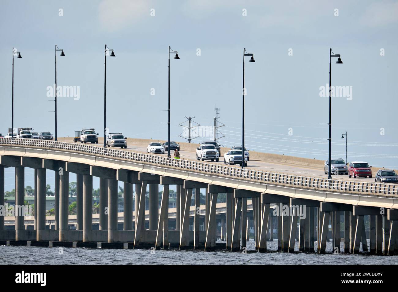 Barron Collier Bridge and Gilchrist Bridge in Florida with moving ...