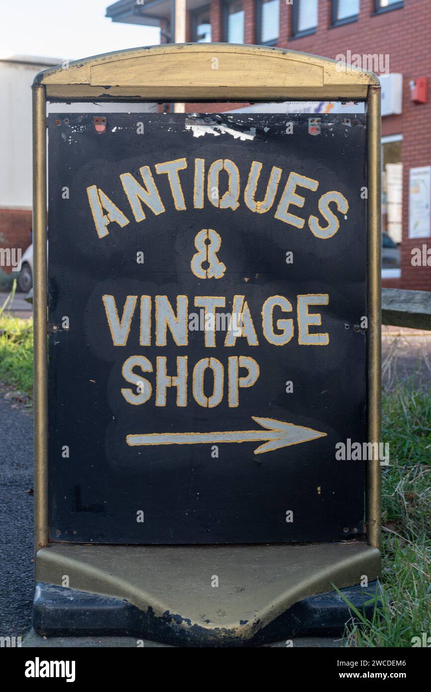 Antiques & Vintage Shop sign outside an antiques shop, England, UK ...