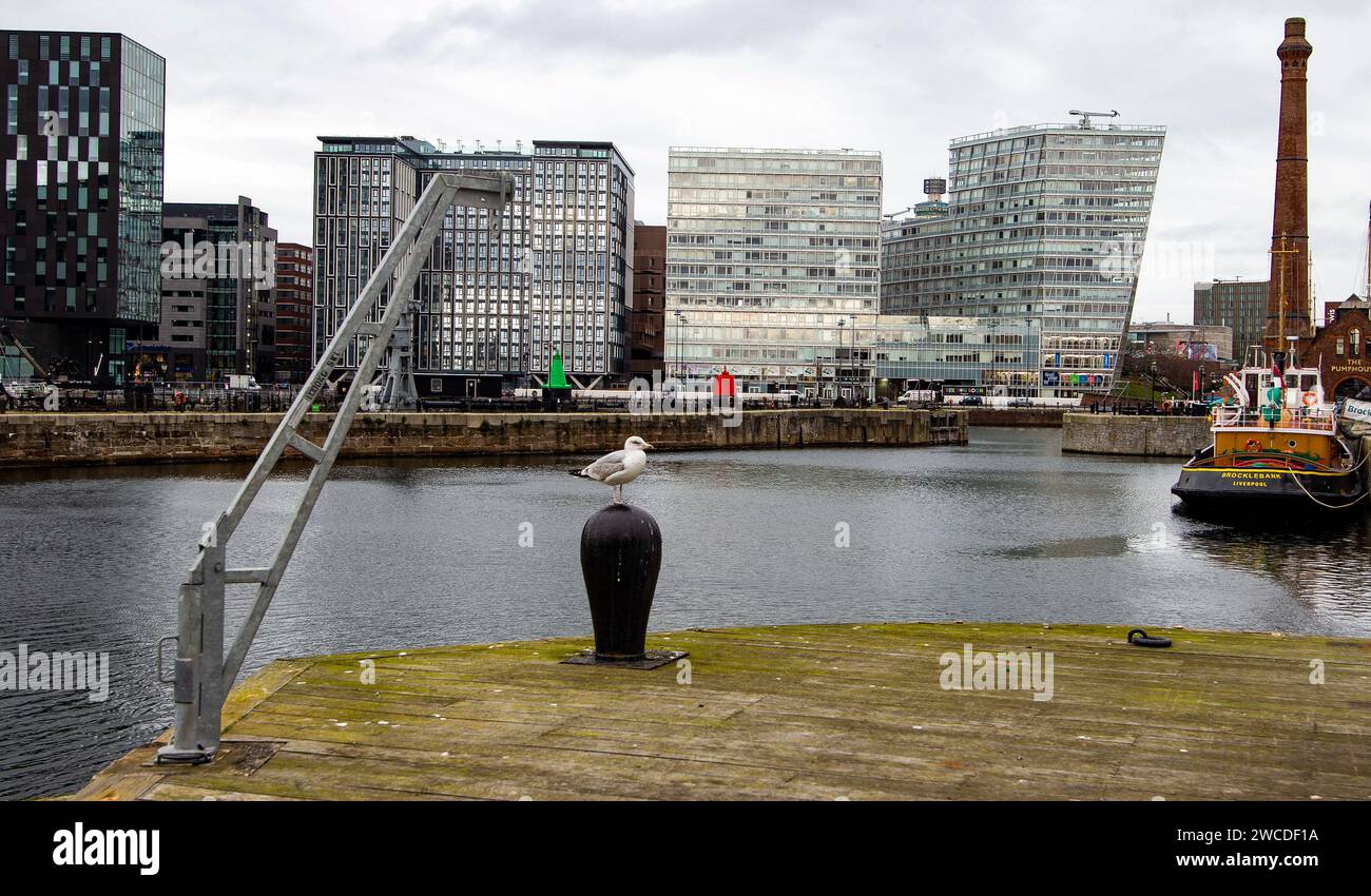 Liverpool docks looking across at the newer high rise buildings with ...