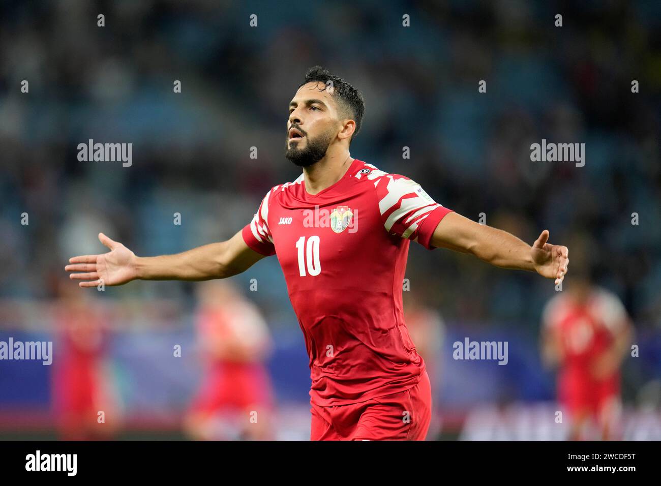 Jordan's Mousa Altamari celebrates after scoring his side's fourth goal ...
