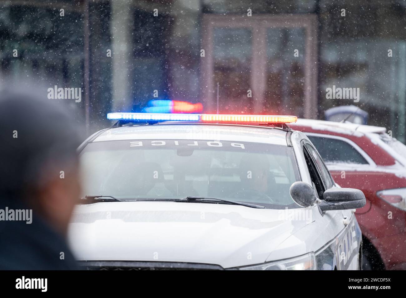 A Police car flashes its lights on Monday Jan. 15, 2024 Stock Photo - Alamy