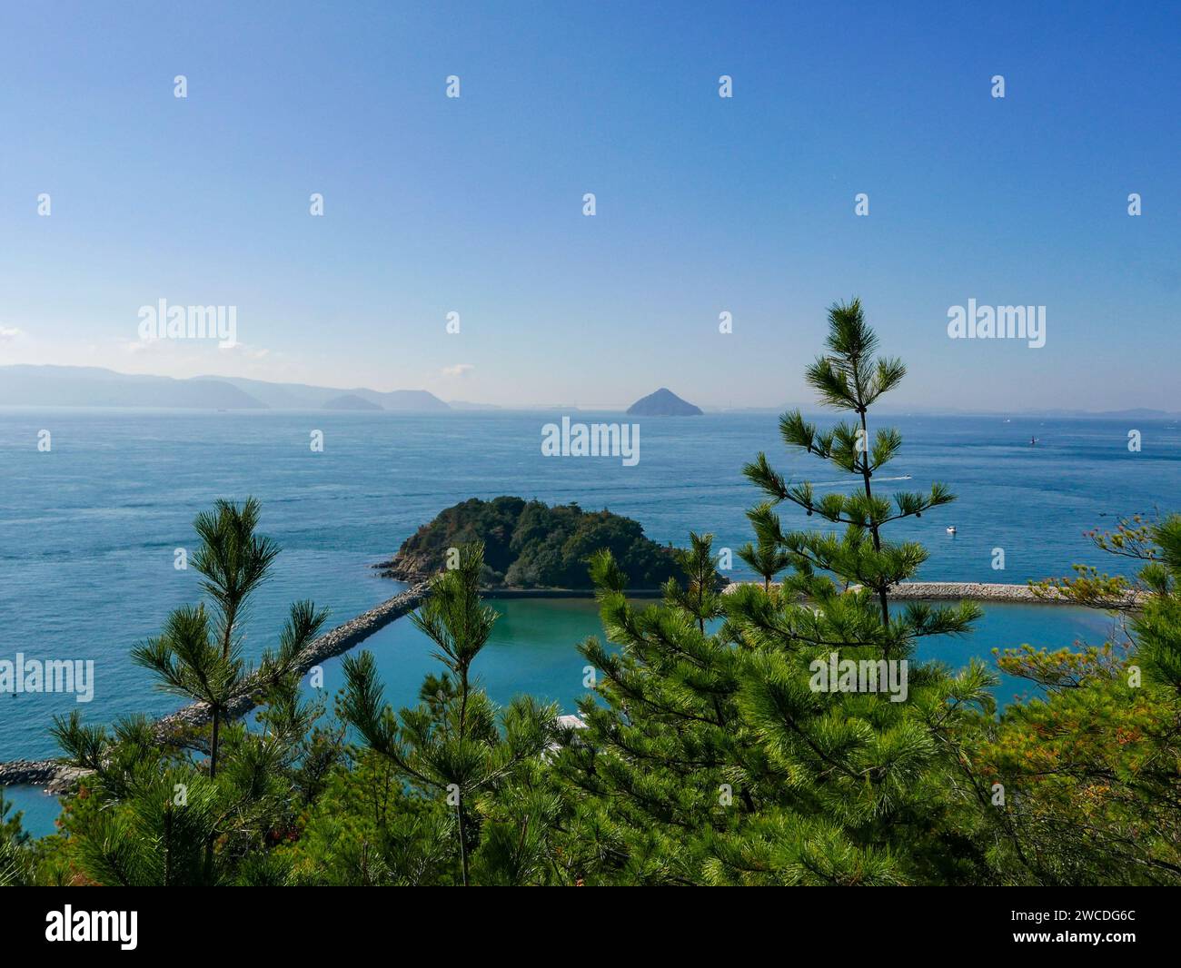 View of the sea and a small island from the island of Naoshima in Japan ...