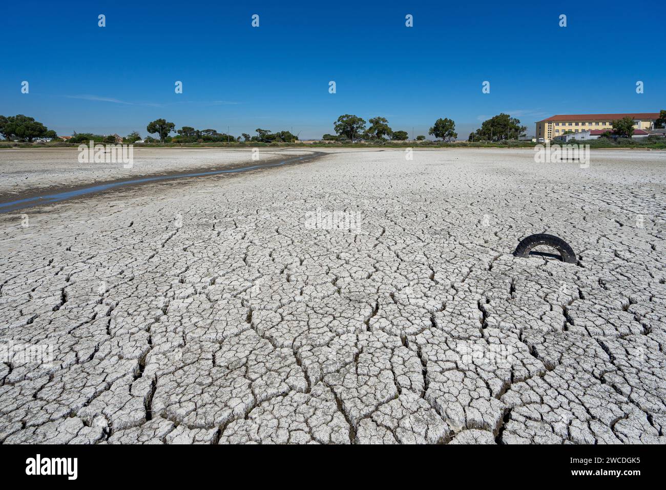 cracked floor of dry river where sludge was. Representation of a period ...