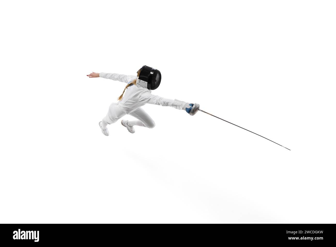 Women in competitive sports. A female fencer in action, promoting women ...