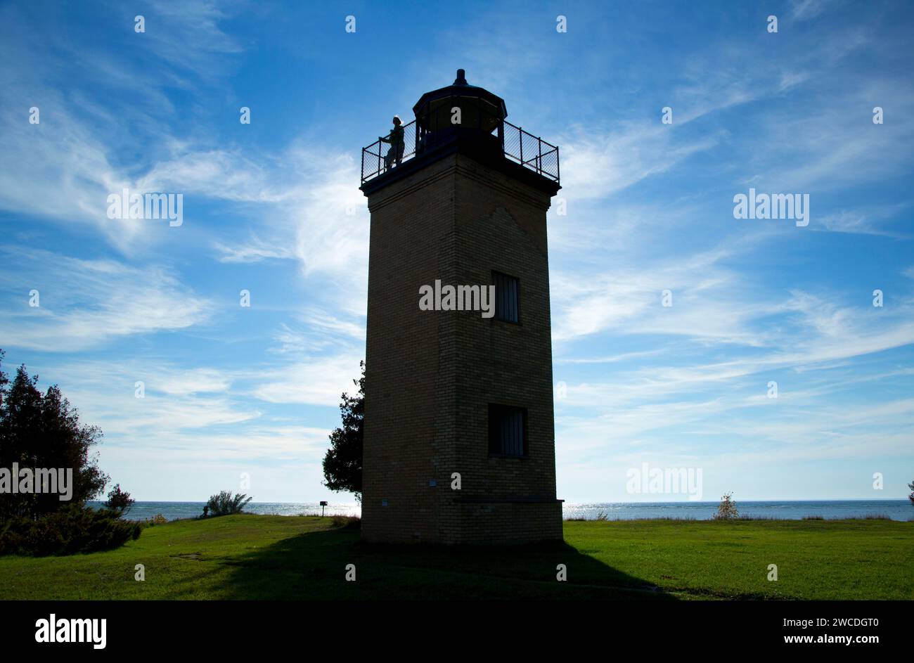 Peninsula Point Lighthouse silhouette, Hiawatha National Forest ...