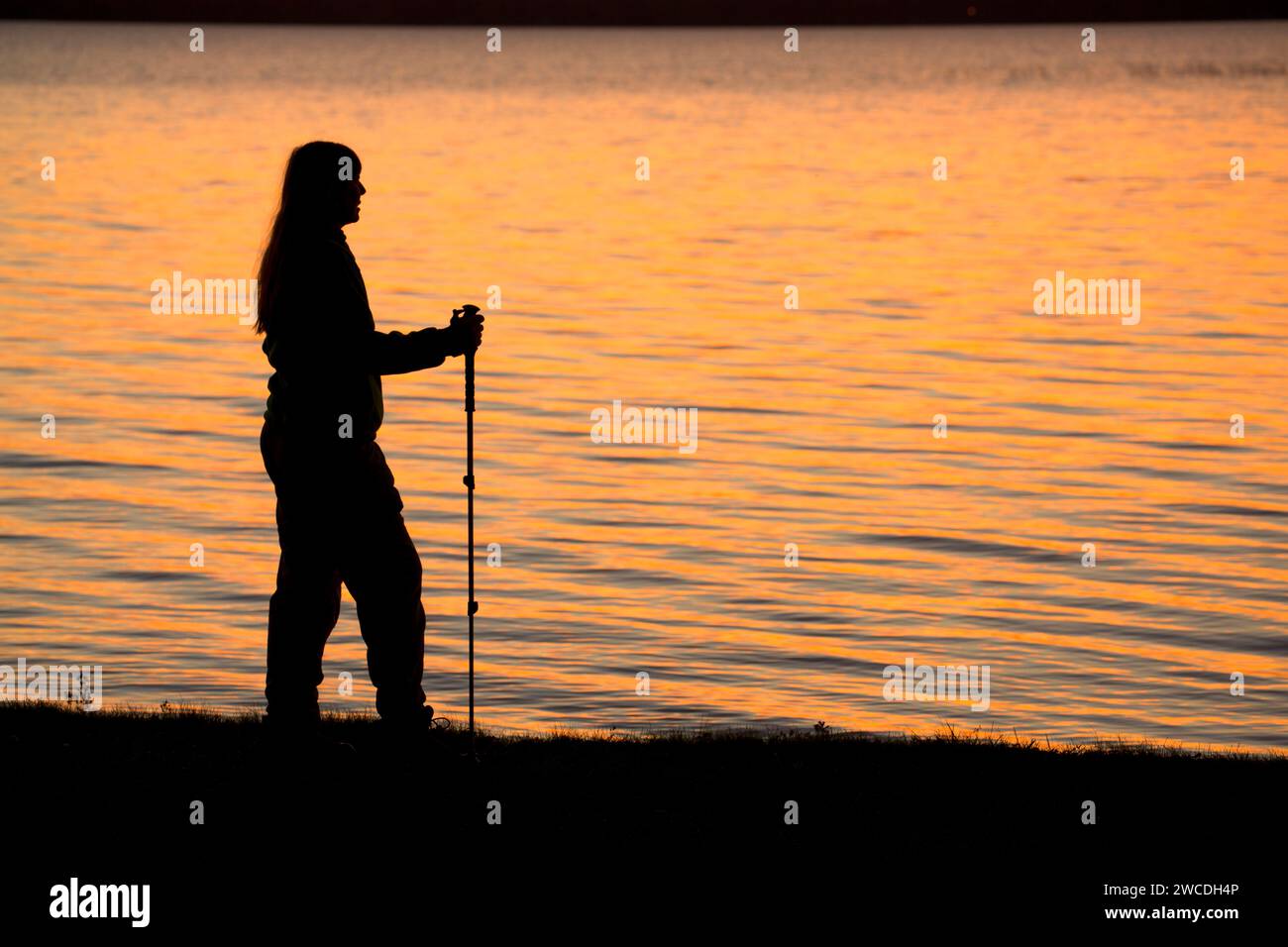 Dawn with hiker at Indian Lake, Indian Lake State Park, Michigan Stock ...