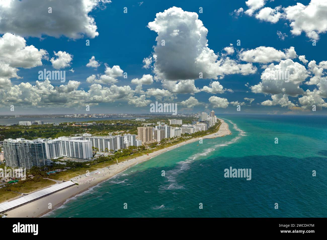 Miami Beach is popular vacation spot in southern Florida. Sandy beach ...