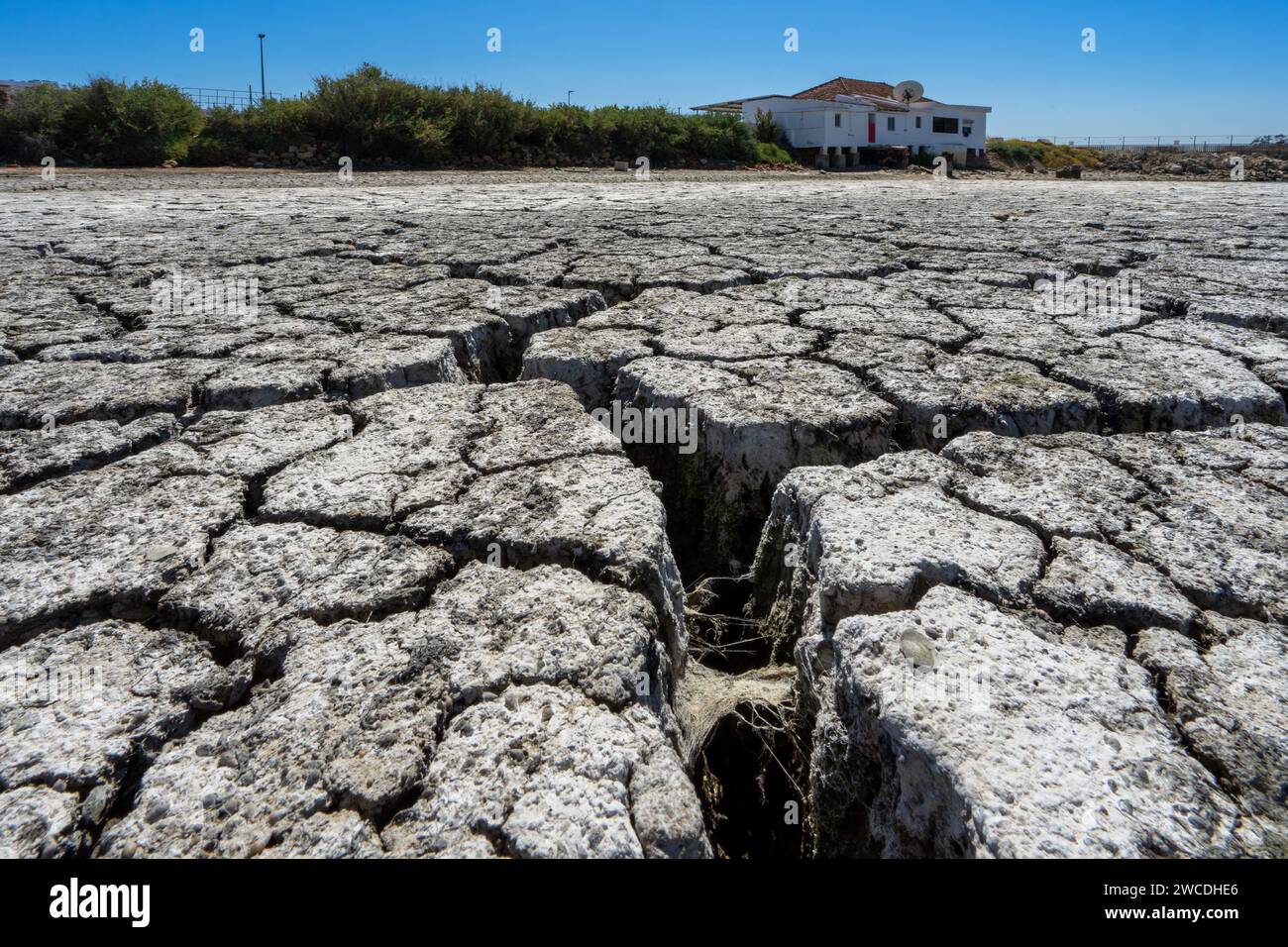 cracked floor of dry river where sludge was. Representation of a period ...