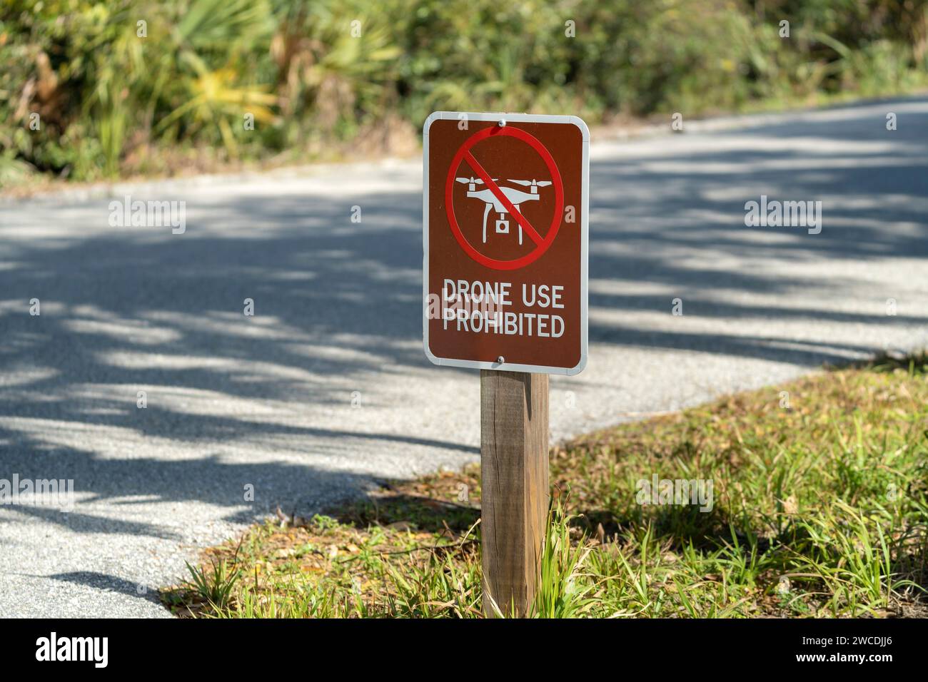 Signpost with warning about drone usage prohibition in state park ...