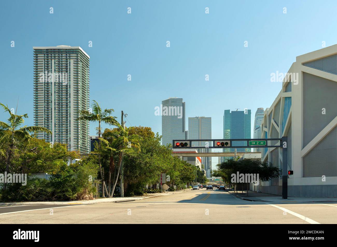 Traffic lights for traffic regulation high above street in Miami ...