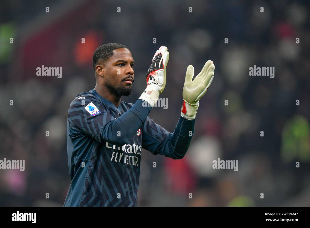 Milano, Italy. 14th Jan, 2024. Goalkeeper Mike Maignan (16) of AC Milan ...