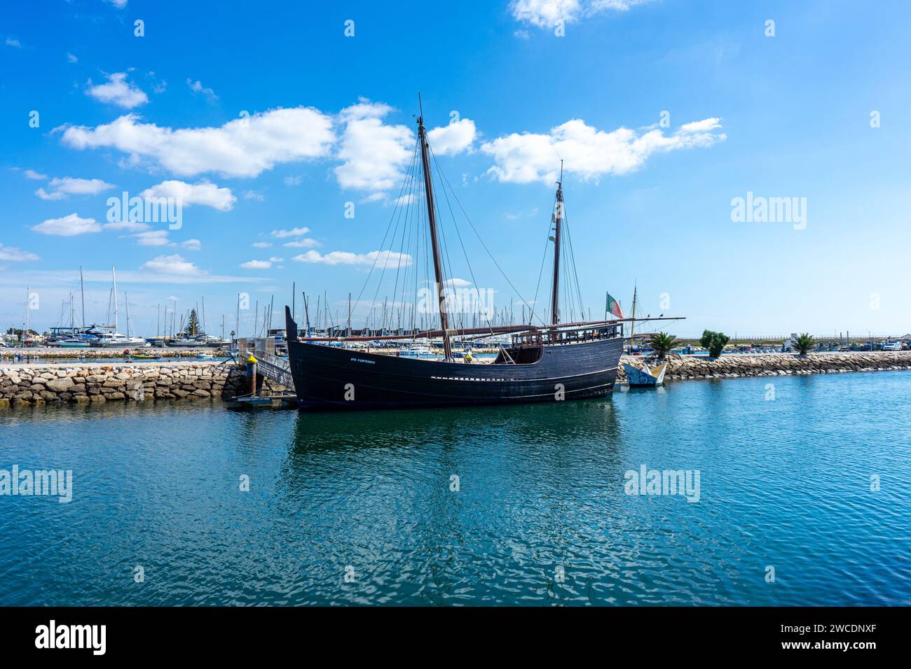 LAGOS, PORTUGAL - FERBUARY 28, 2023: Ships and boats in port in Lagos ...