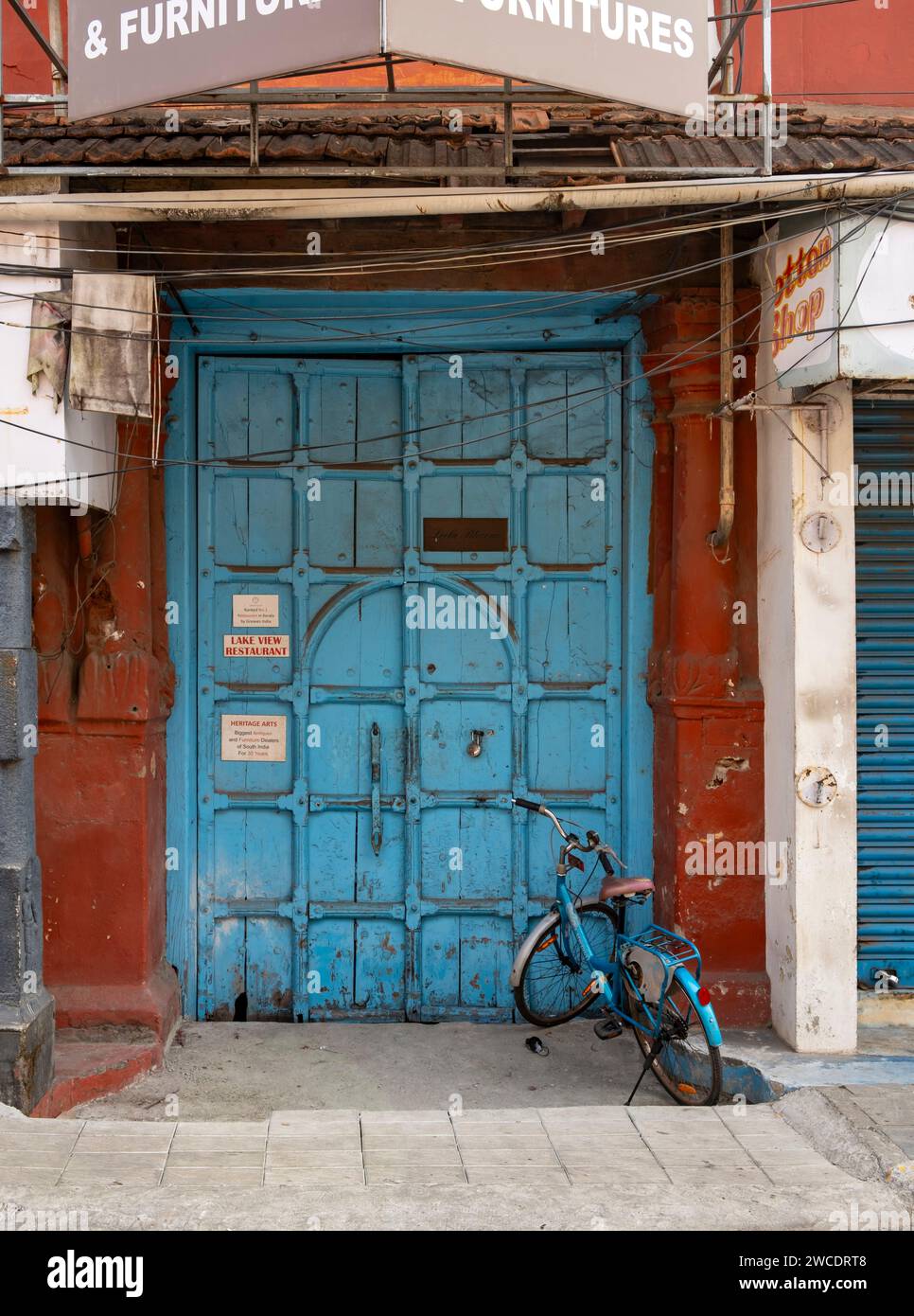 Street scene with blue door, Matancherry, Jew Town, Cochin, Kerala ...