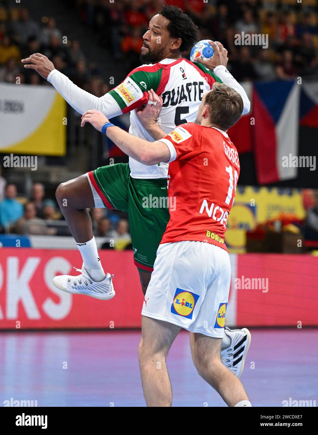 Mathias Gidsel, right, of Denmark and Gilberto Duarte, left, of ...