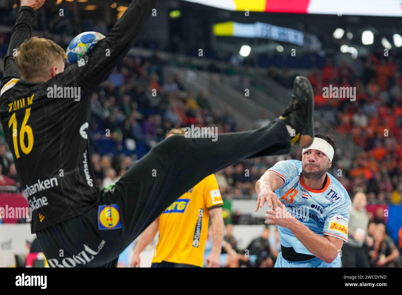 Samir Benghanem of the Netherland, right, tries to score as Sweden's ...