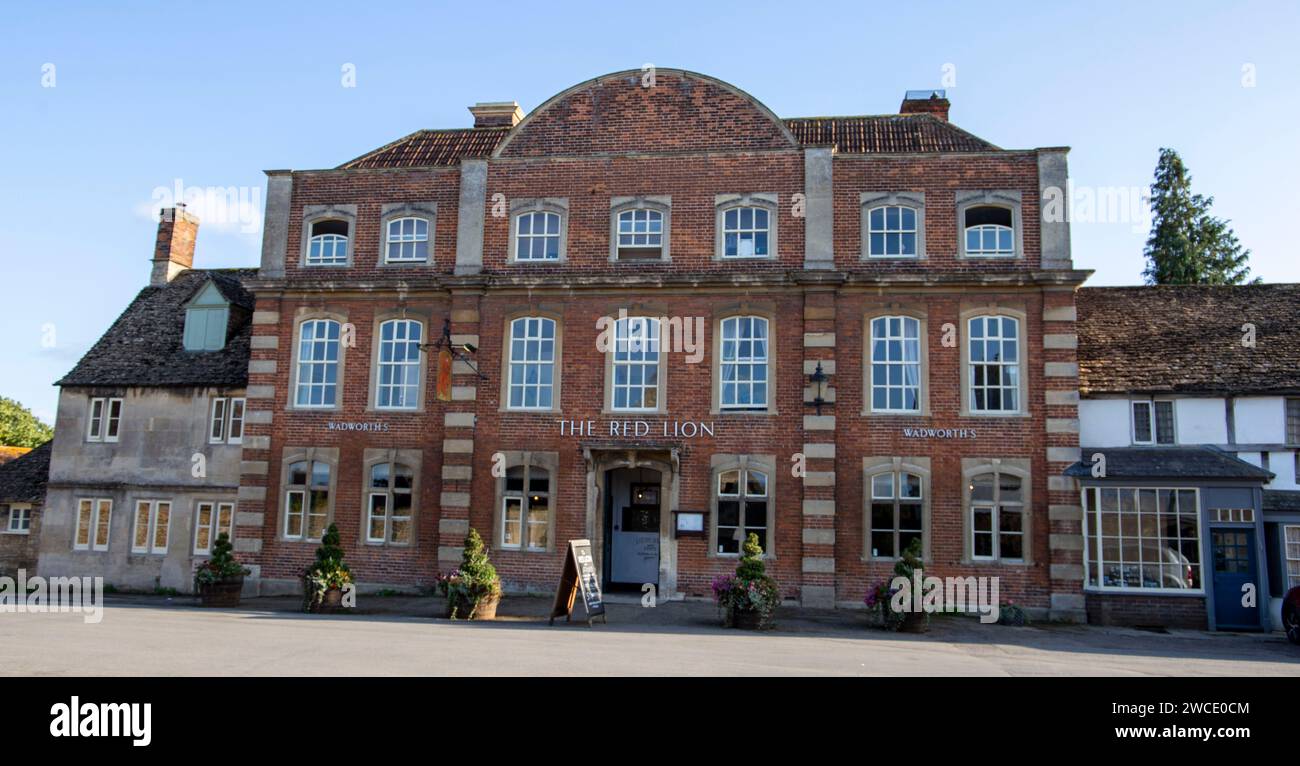 Red Lion redbrick Georgian public house at Lacock Chippenham Wiltshire ...
