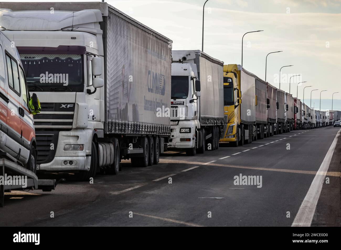 Medyka, Poland, January 15, 2024. Trucks stand in a line to cross the ...