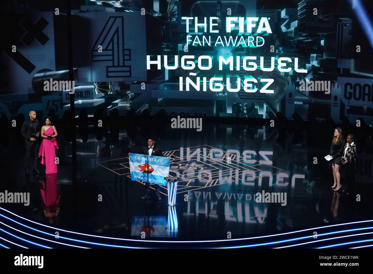 Hugo Daniel Iniguez on stage after receiving the FIFA Fan Award ...